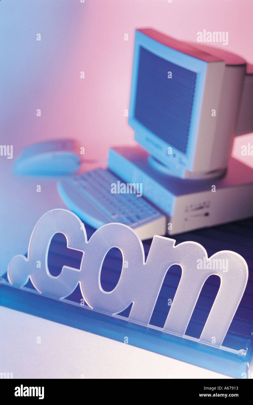 Computer and Dot Com Symbol Stock Photo - Alamy