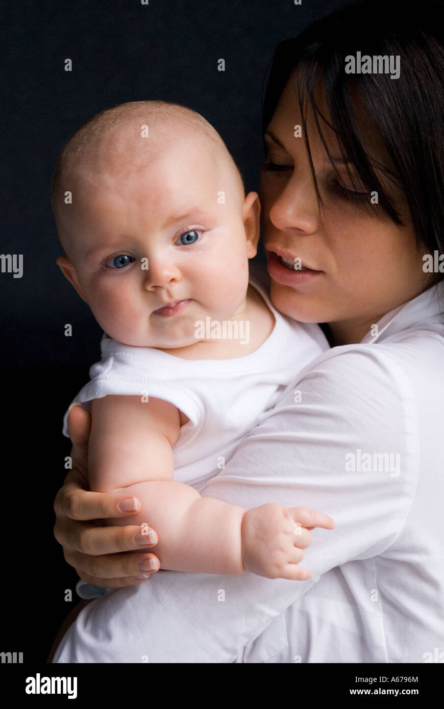 Comforts her baby hi-res stock photography and images - Alamy