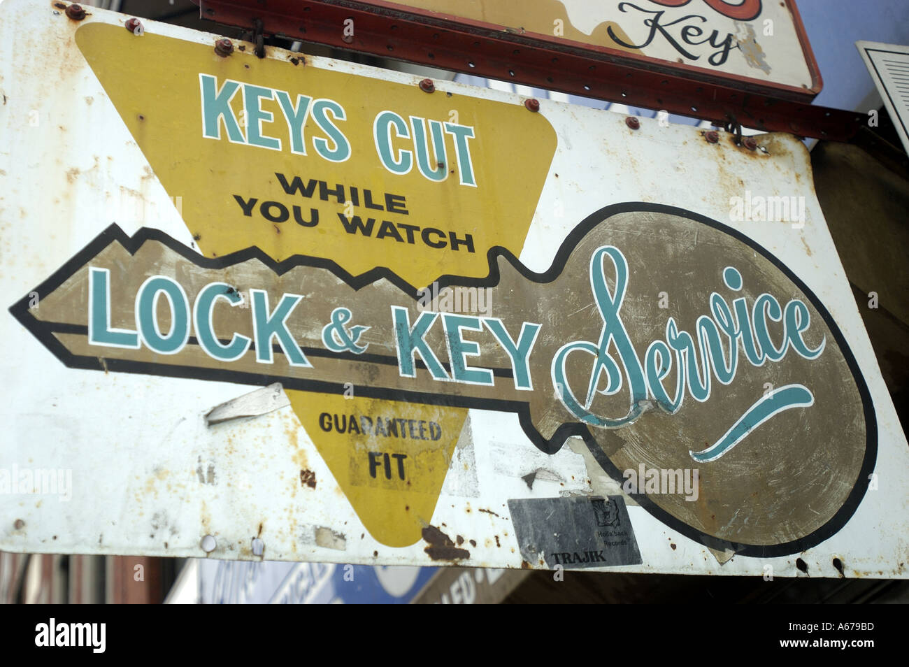 Locksmith shop sign key Stock Photo - Alamy