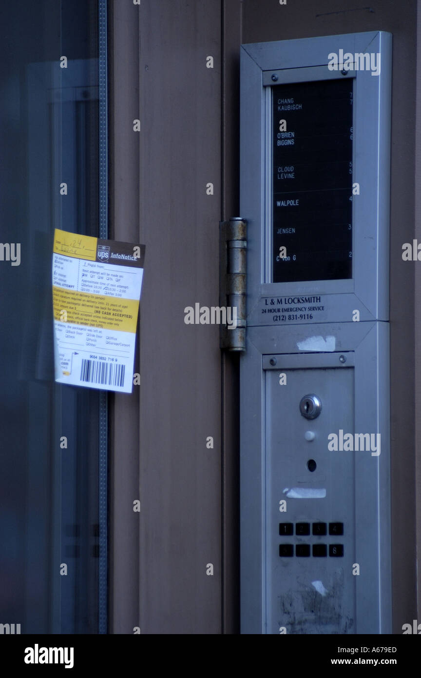 UPS sign mail delivery signs doorway missed vertical Stock Photo - Alamy