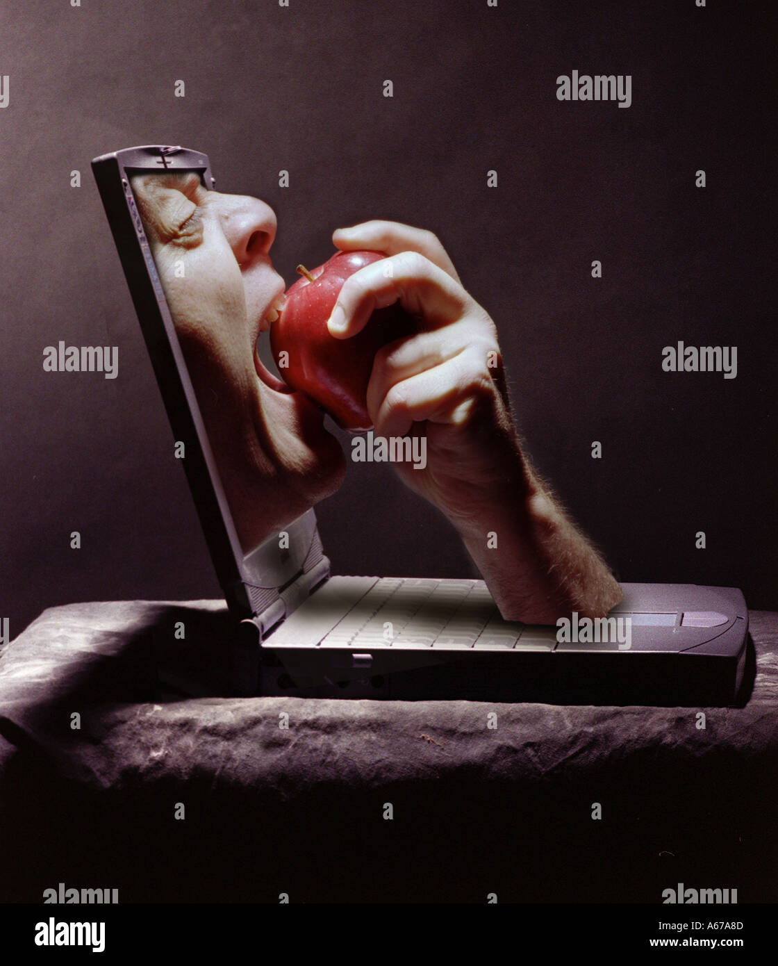 Idea Mans face coming out of computer eating apple. Apple Computer ...