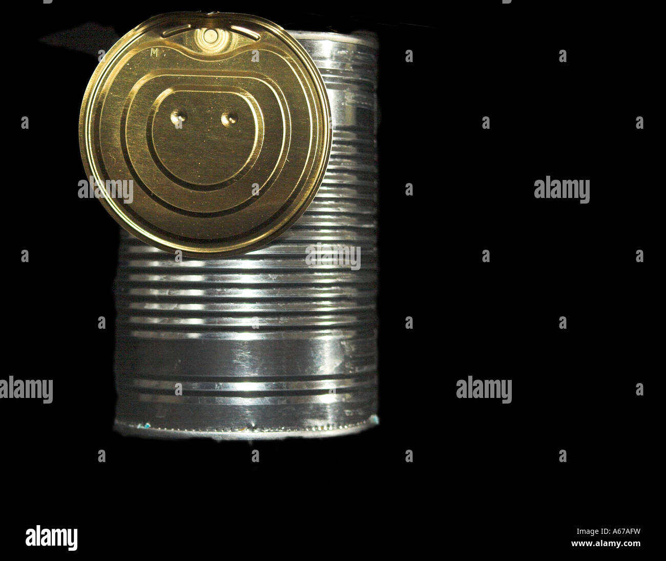 An opened tin can Stock Photo - Alamy
