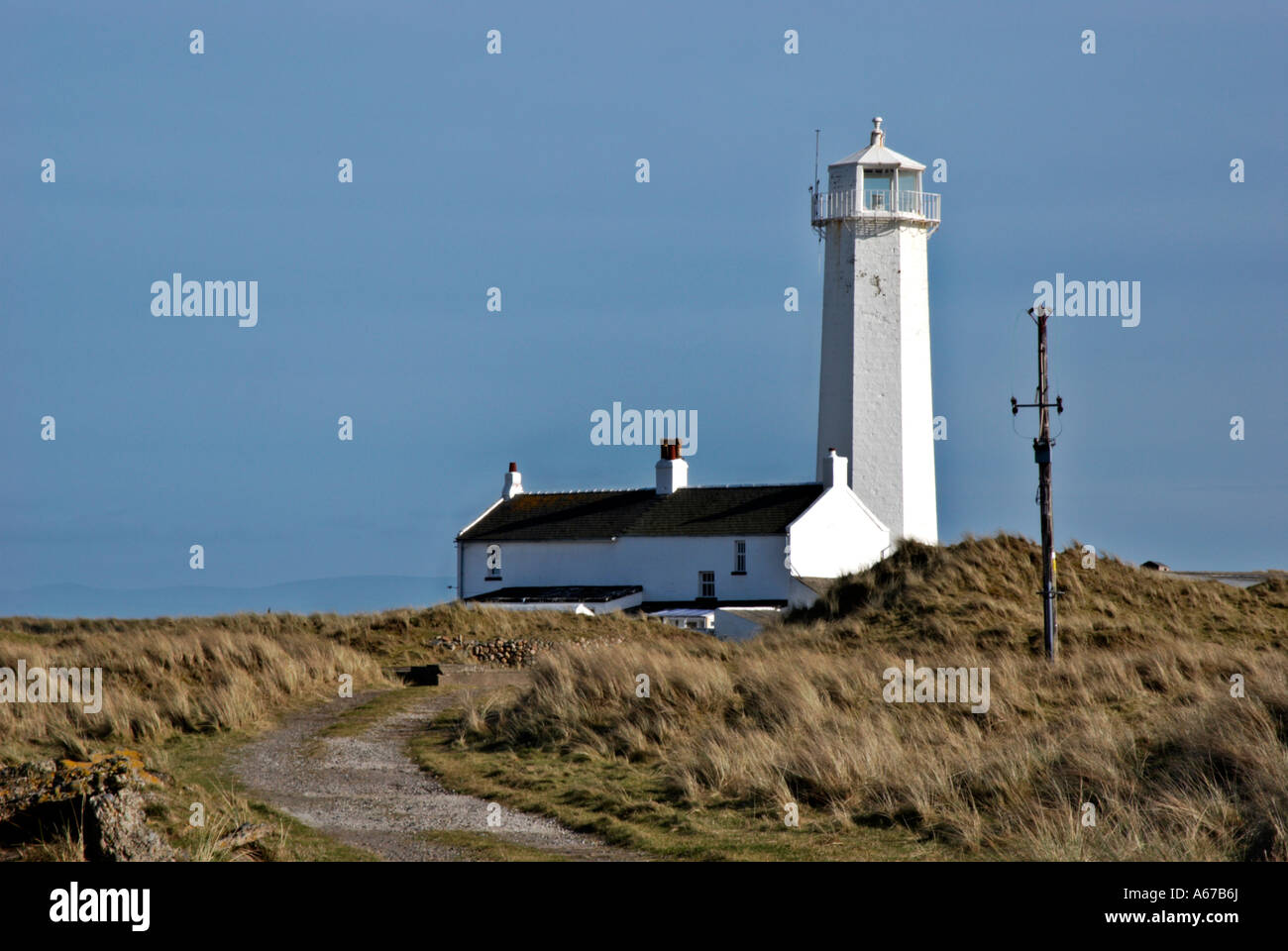 Lighthouse and keepers cottage Stock Photo - Alamy