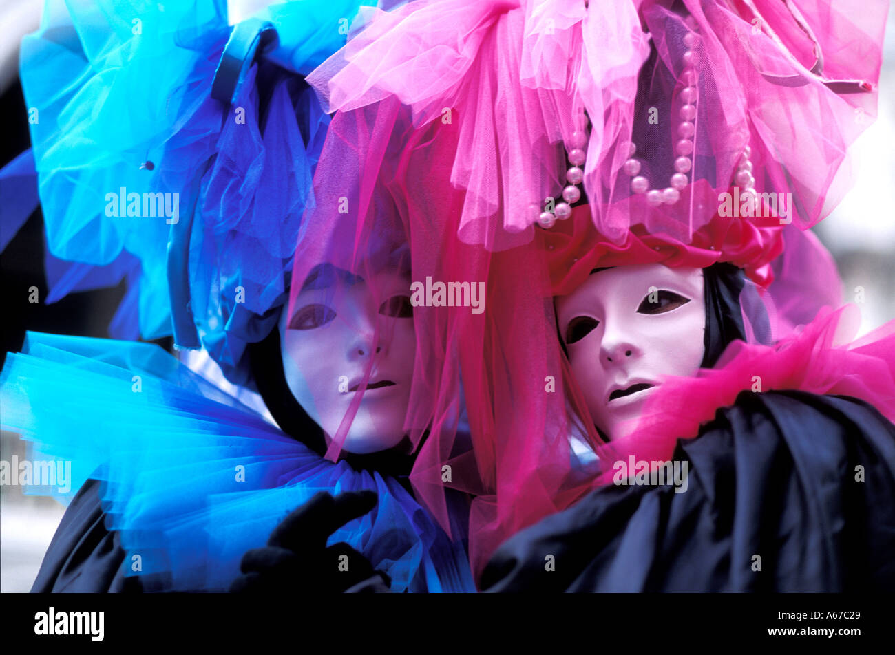 Pink and turquoise mask Carnival Venice Stock Photo - Alamy