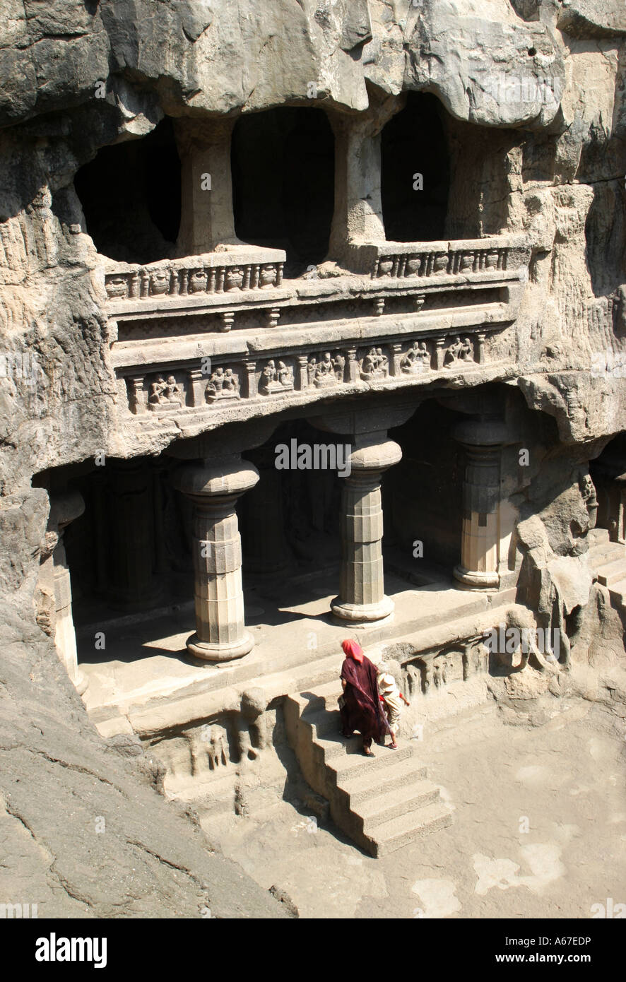Indian mother and child visit the important Kailasa Cave at Ellora ...
