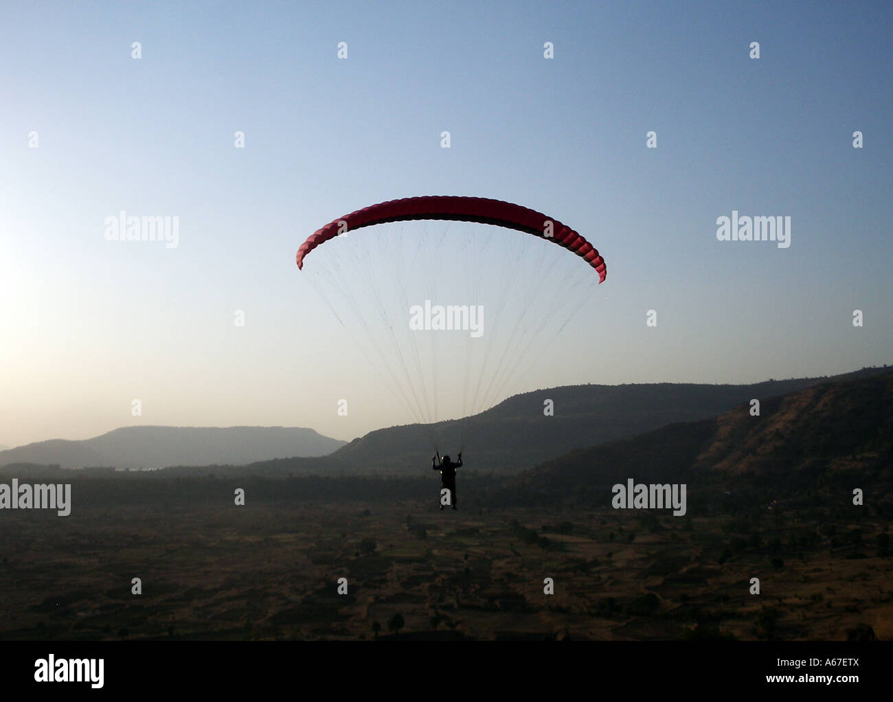 Paraglider over plain, Kamshet, Western Ghats, Maharashtra, India Stock ...