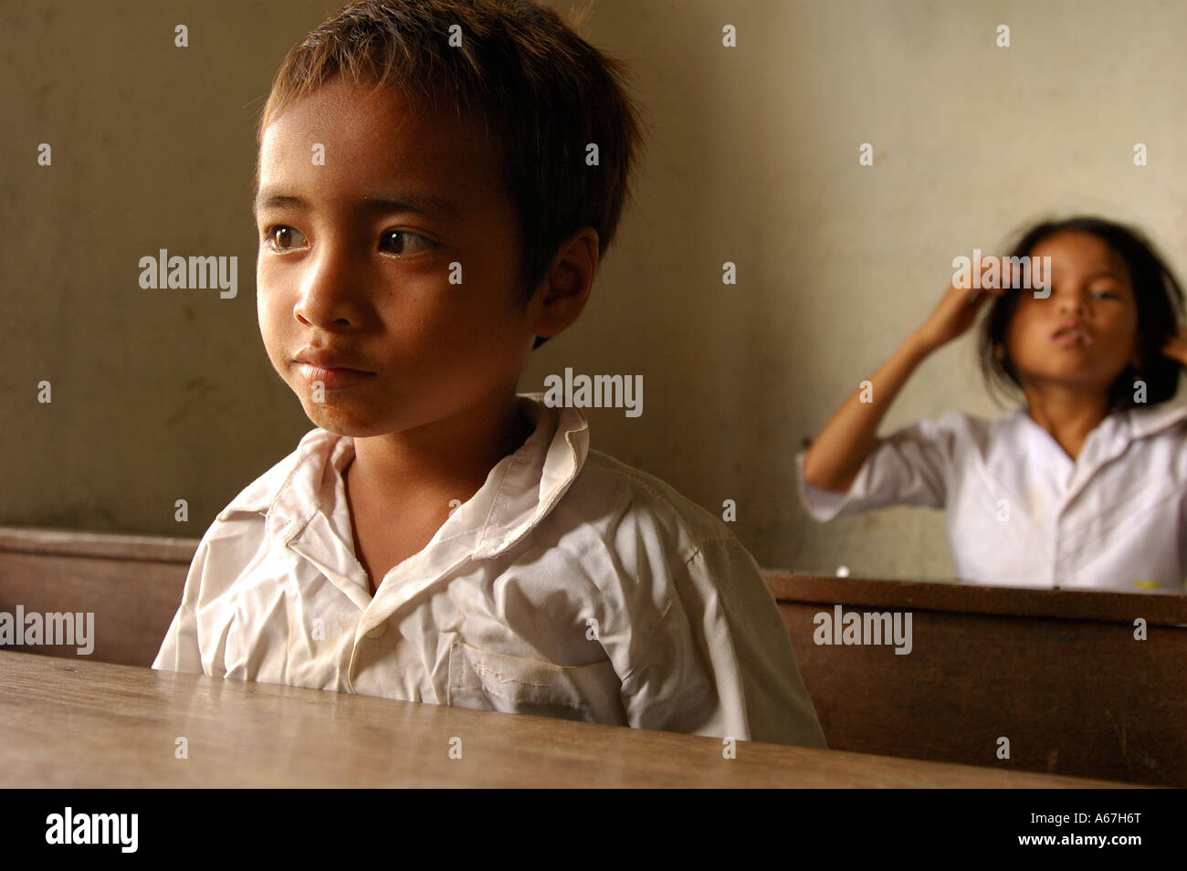 Khmer school children are studying in their classroom at the small Sras ...