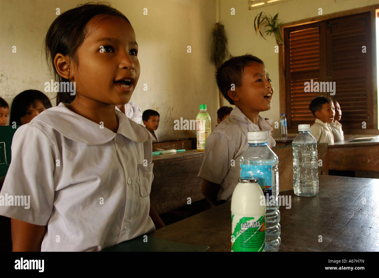 Khmer school children are studying in their classroom at the small Sras ...