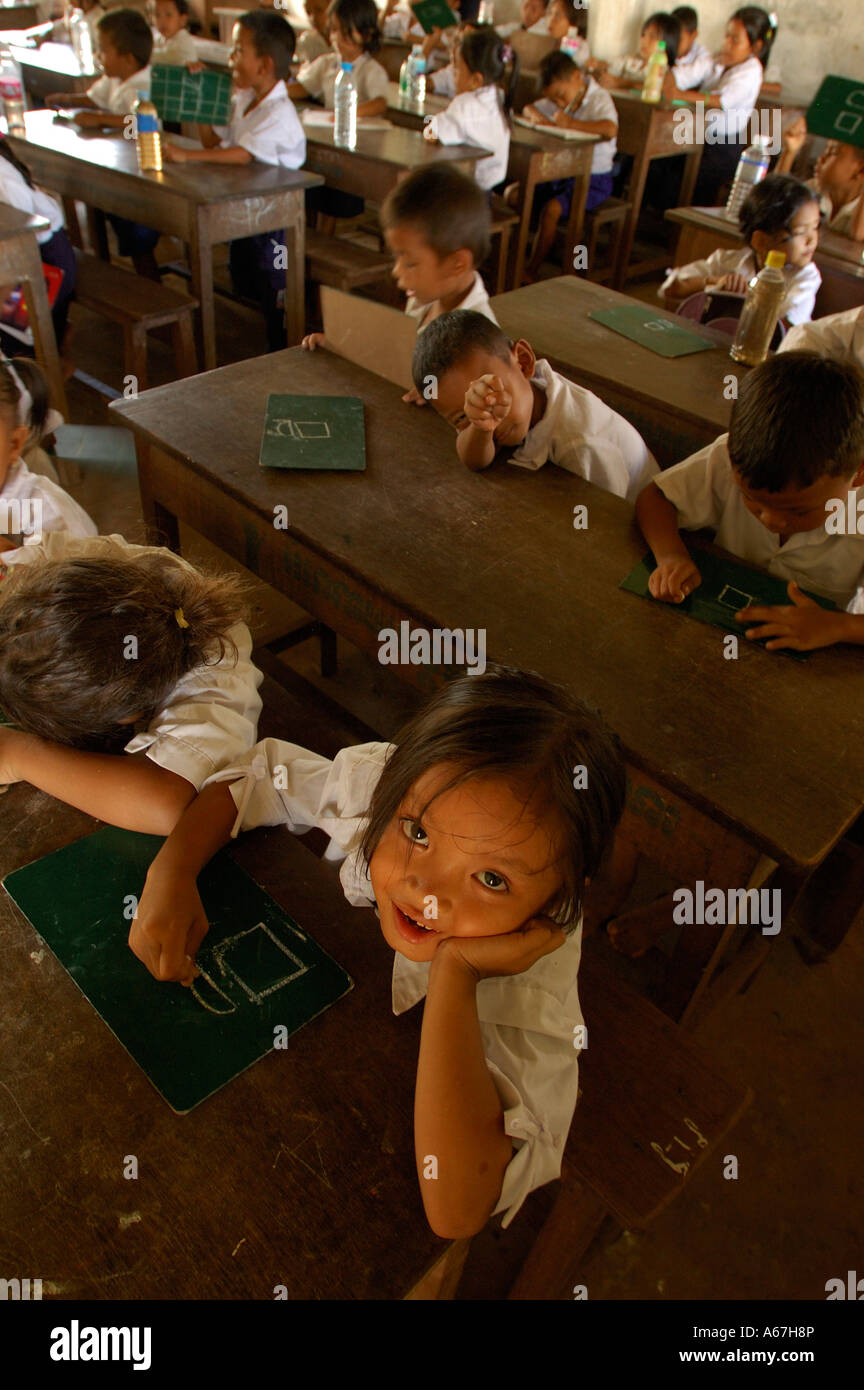 Khmer school children are studying in their classroom at the small Sras ...