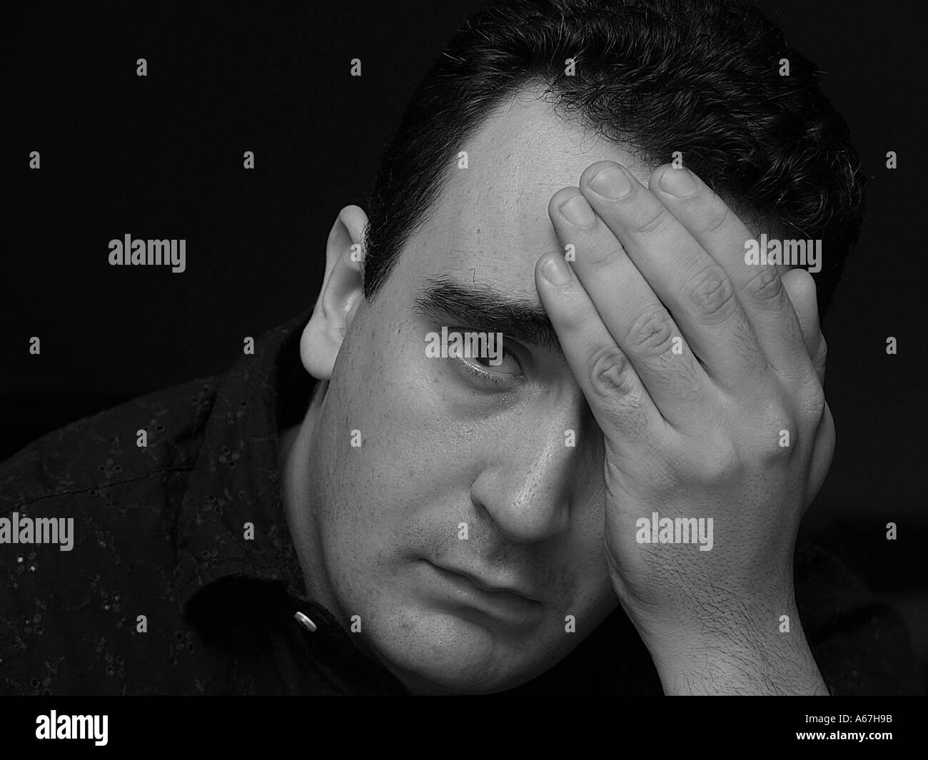 black and white portrait of young man expression of despair Stock Photo ...