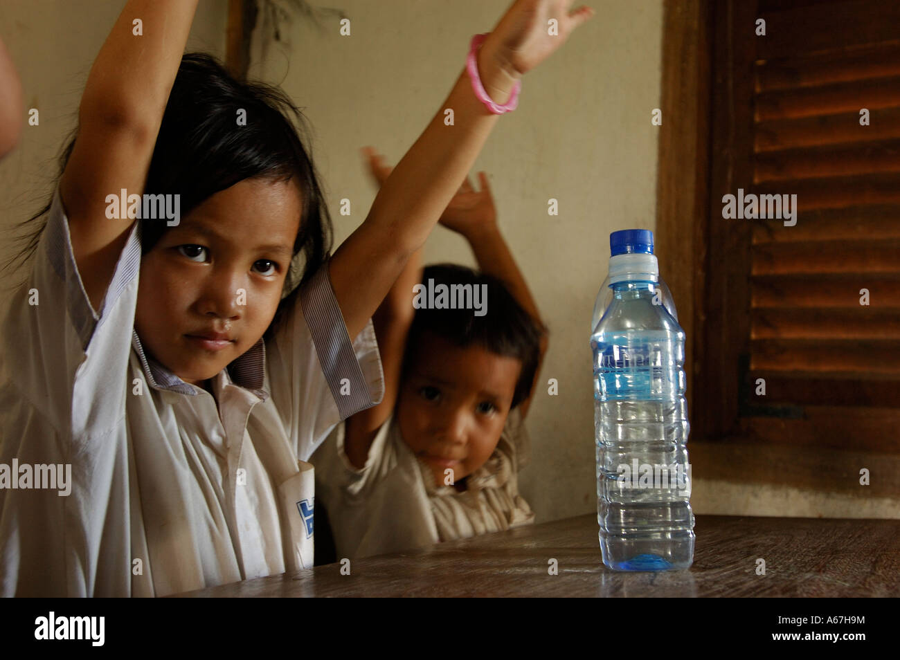 Khmer school children are studying in their classroom at the small Sras ...