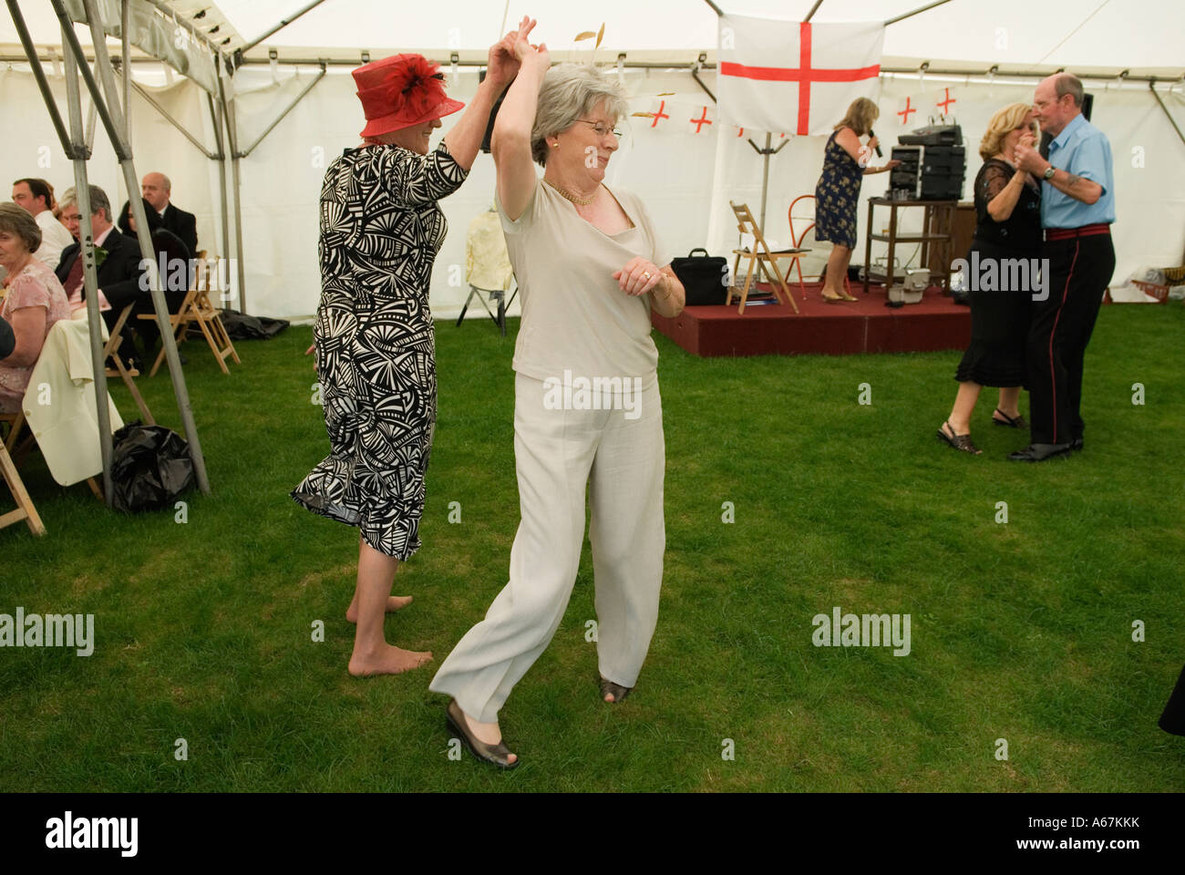 Women jive dancing together summer garden party London England 2006 ...