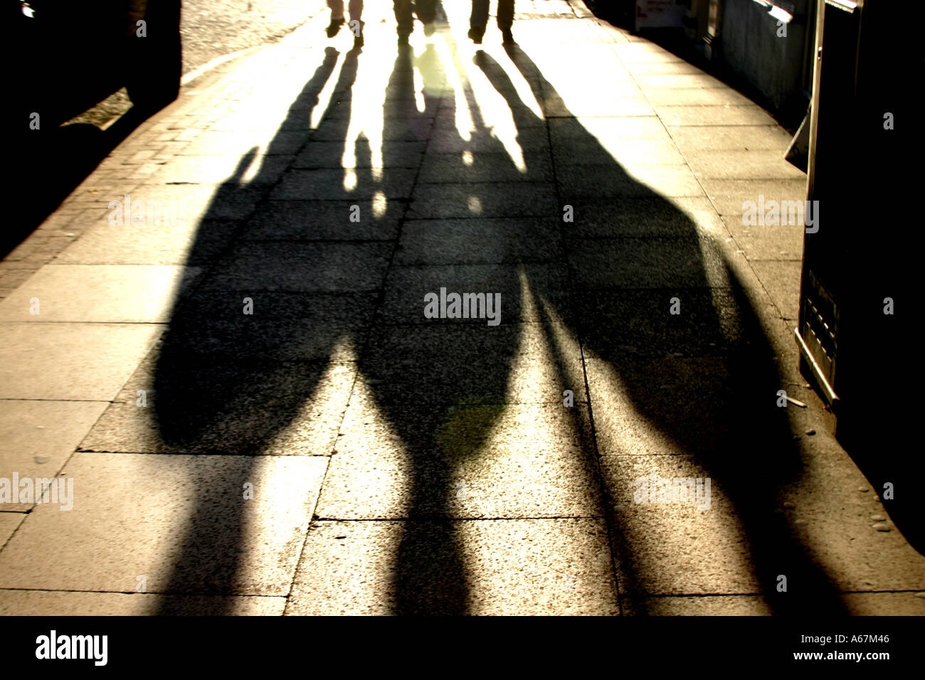 goodfellas street shadows bright sunshine gangster mood Stock Photo - Alamy