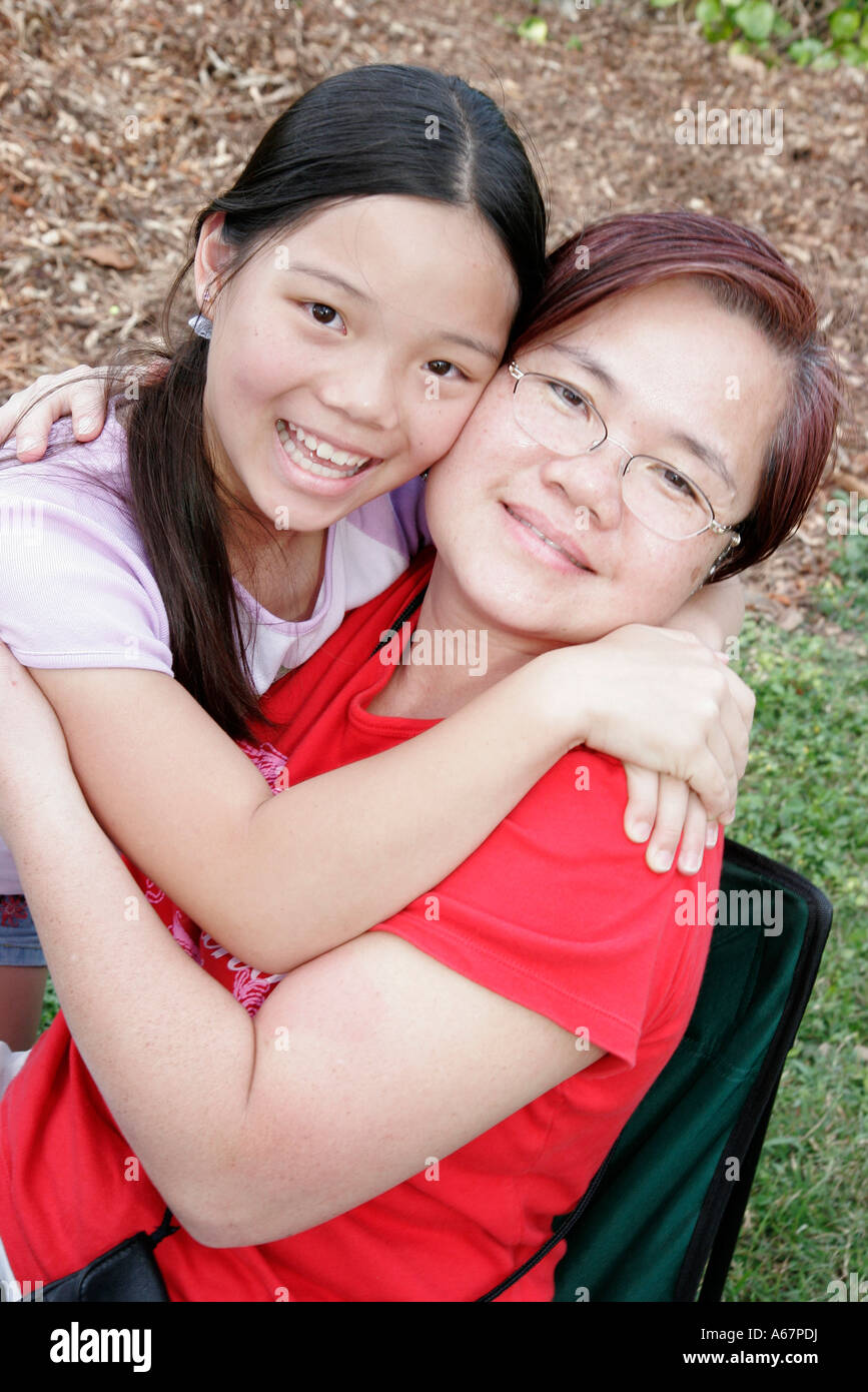 Mother daughter hugging fair hi-res stock photography and images - Alamy