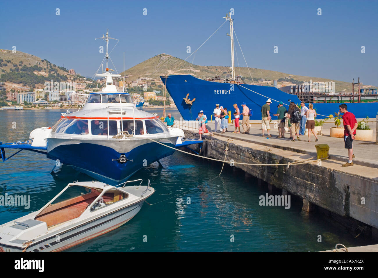 Catamaran from Corfu tied up at jetty in Sarande Albania. JMH2581 Stock ...