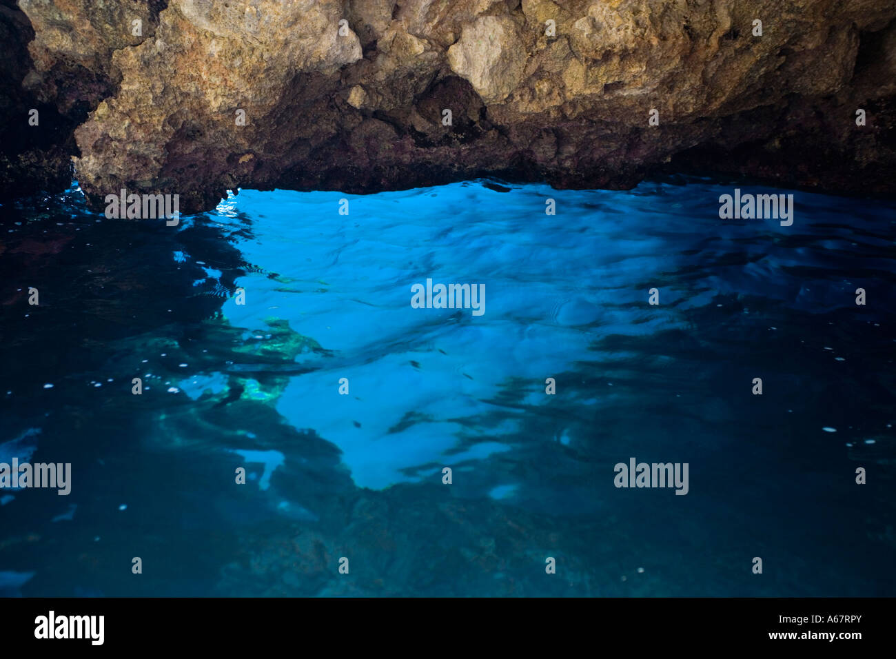 Daylight entering Blue Eye grotto sea cave under water Paleokastritsa ...