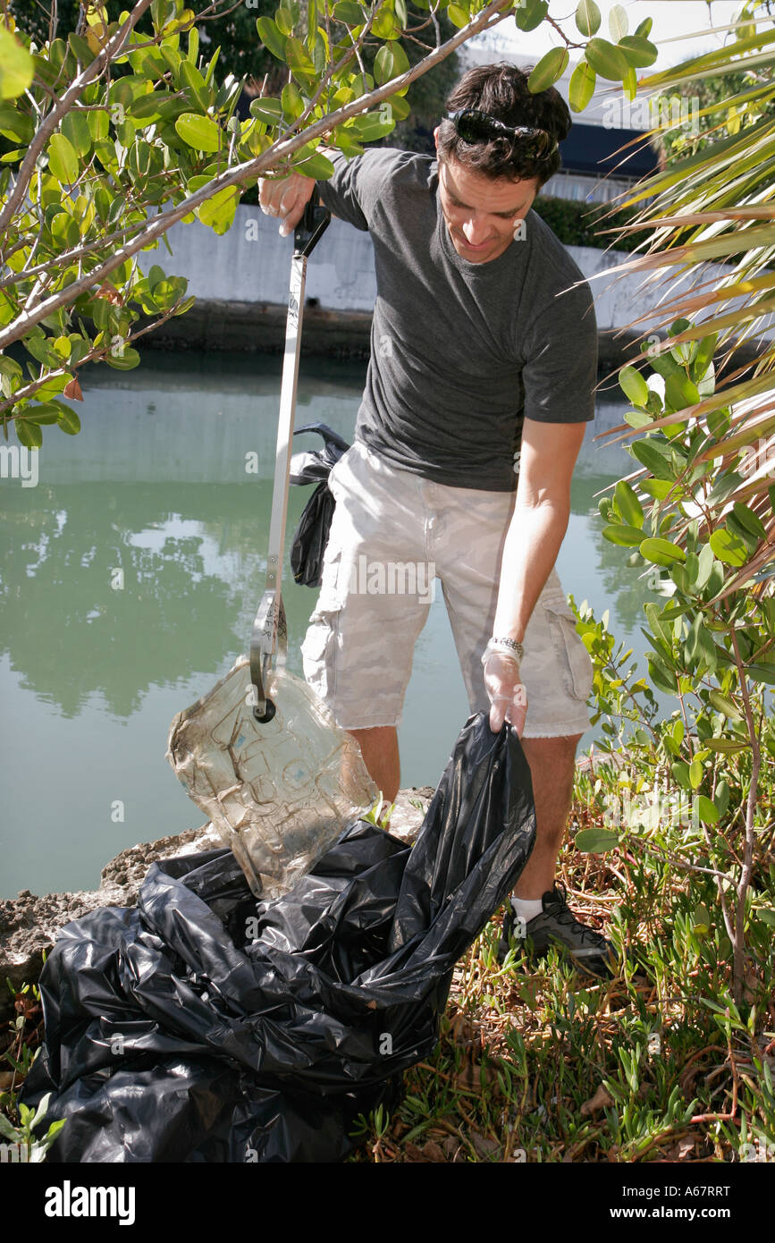 Miami Beach Florida,Collins Canal,community volunteer cleanup,Hispanic ...