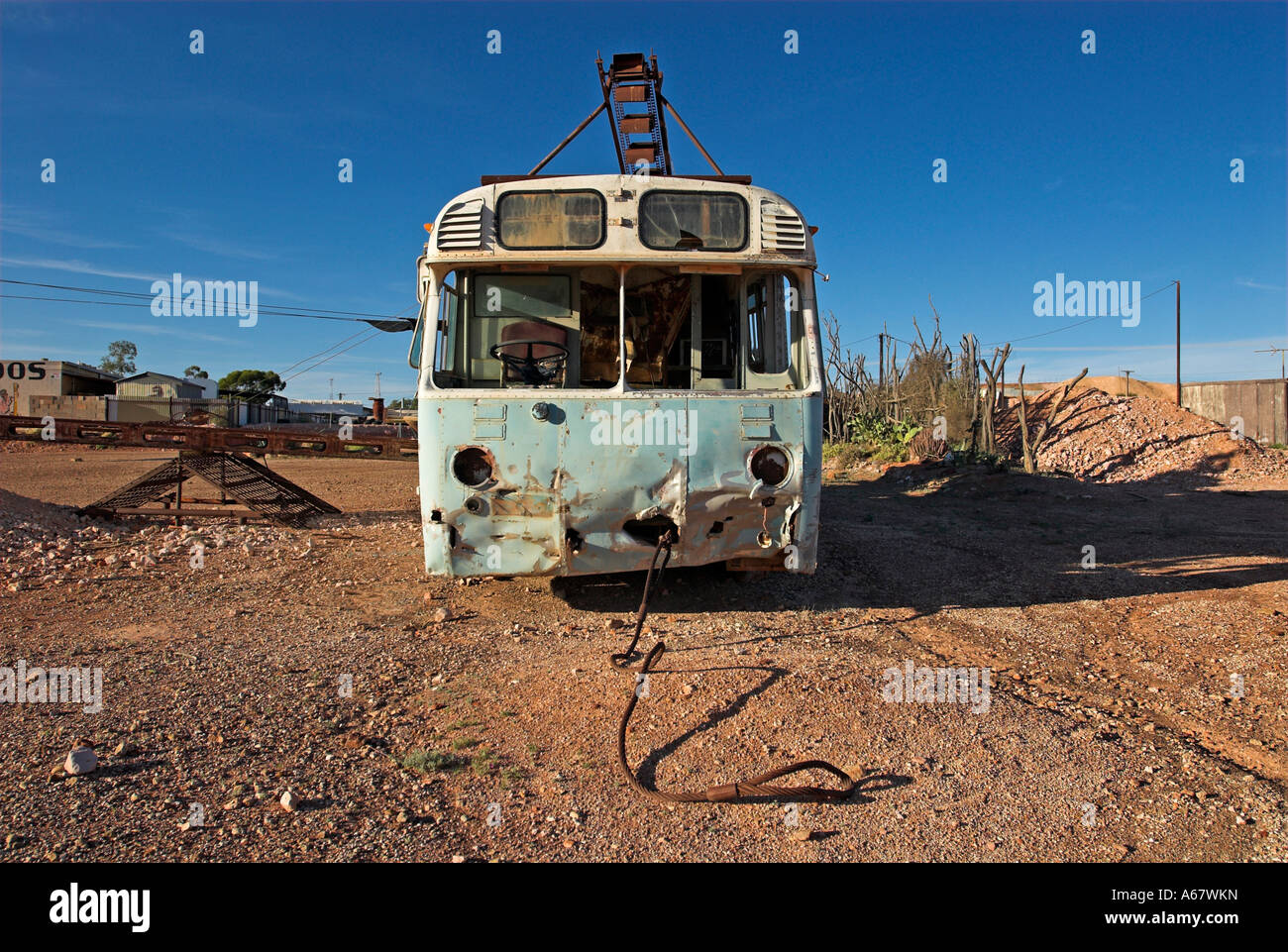 Old bus which was converted to a mining machine, Coober Pedy, South ...