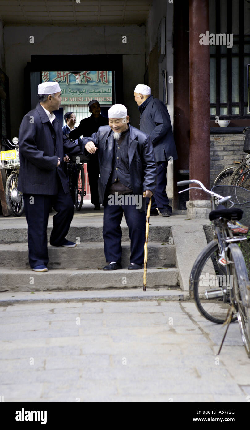 CHINA XIAN Chinese Muslim men in the beautiful gardens of the Great ...