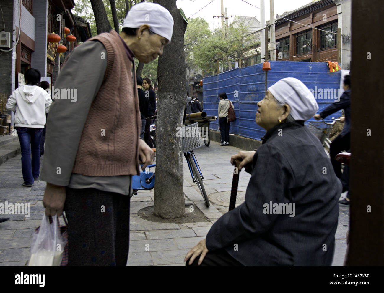 CHINA XI AN Two elderly Chinese women having a conversation on the ...