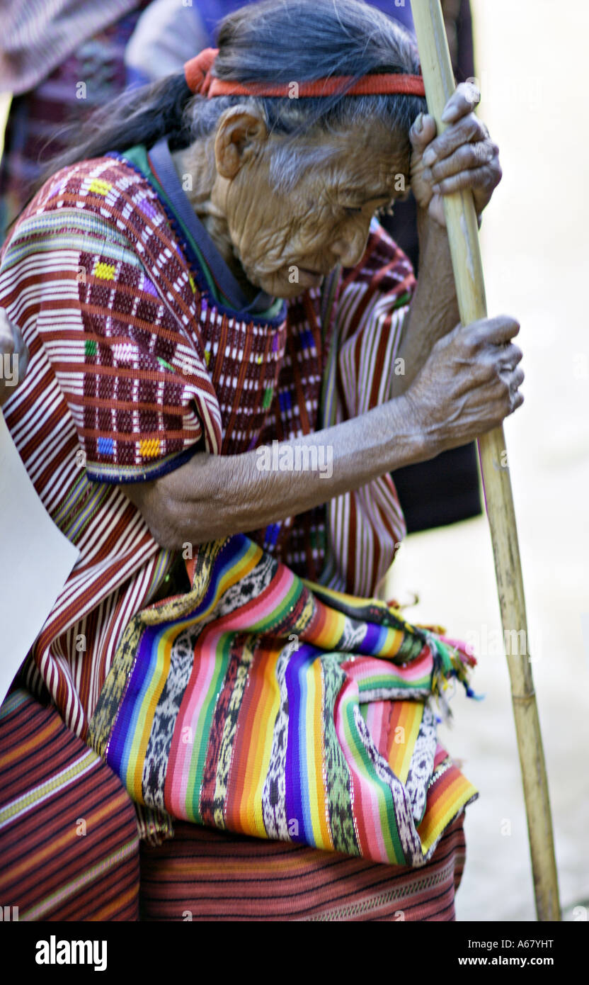 GUATEMALA ACAL An elderly Maya Mam woman in obvious pain leans on her ...