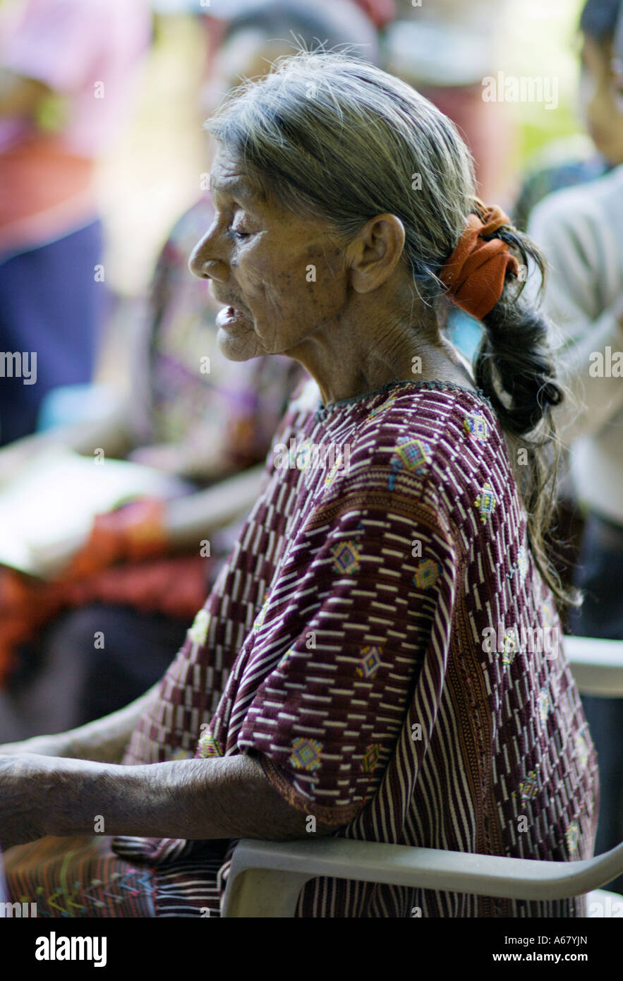 GUATEMALA ACAL An elderly Maya Mam woman in traditional dress of ...