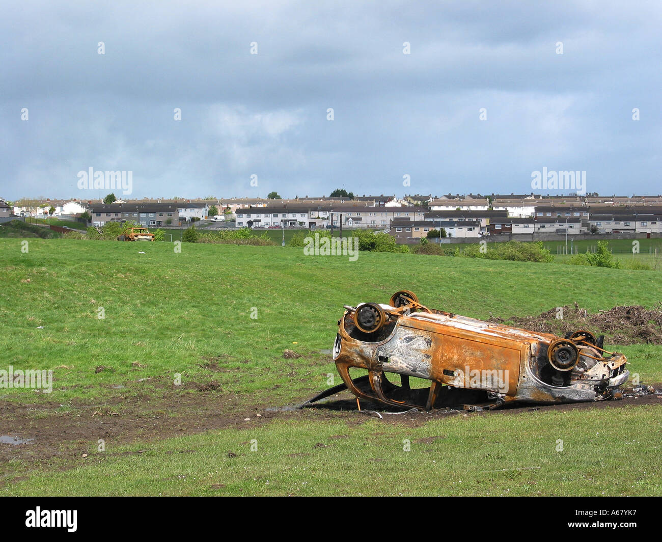 burnt out car left to rot on the outskirts of Dublin Ireland Stock ...