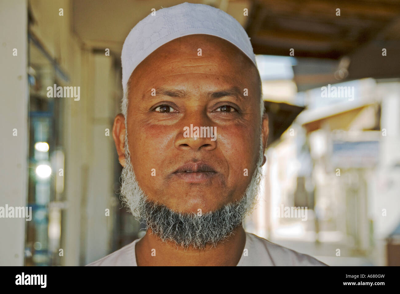 Portrait nativ man with cap and gray beard Oman Stock Photo - Alamy