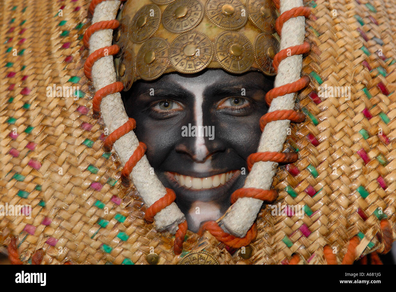Fallera with painted face wearing funny costume during Las Falles ...