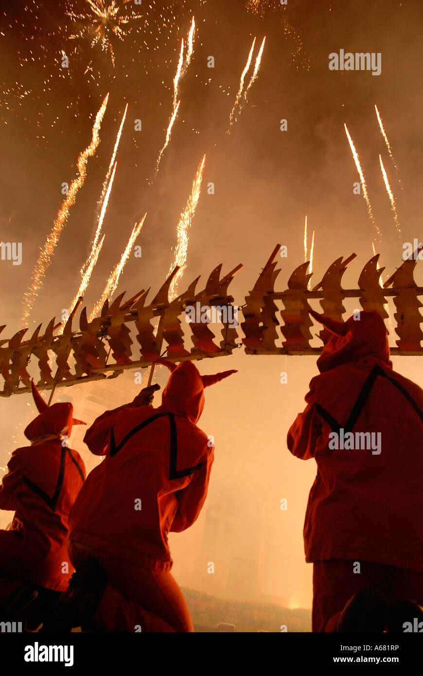 Fallers marching in the street during Cavalcada del Foc Fire Parade on ...