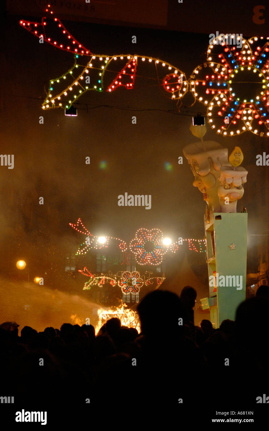 Fallas with fireworks going off during Las Falles traditional festival ...