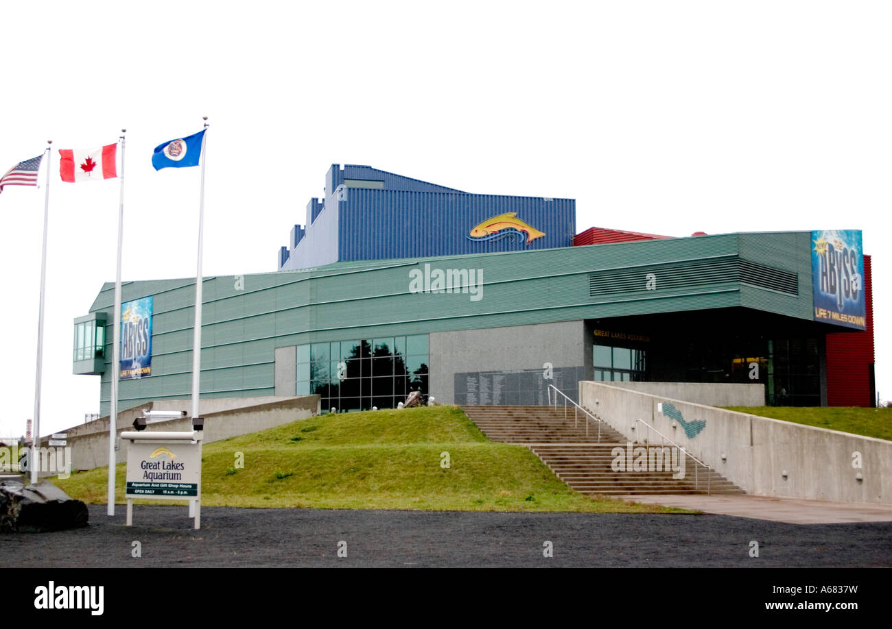 US Canadian and Minnesota flags flying over the Great Lakes Aquarium ...