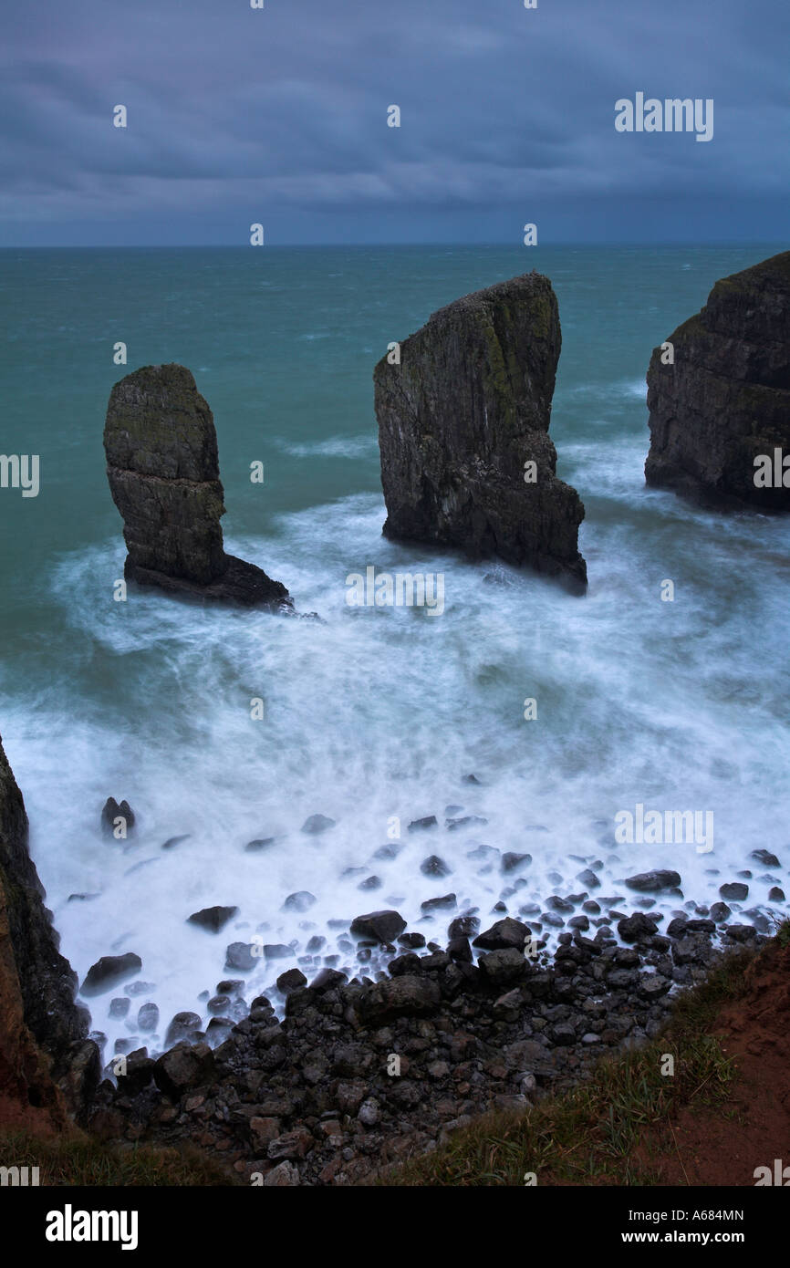 Massive rock stacks guarding the entrance to a secluded Pembrokeshire ...