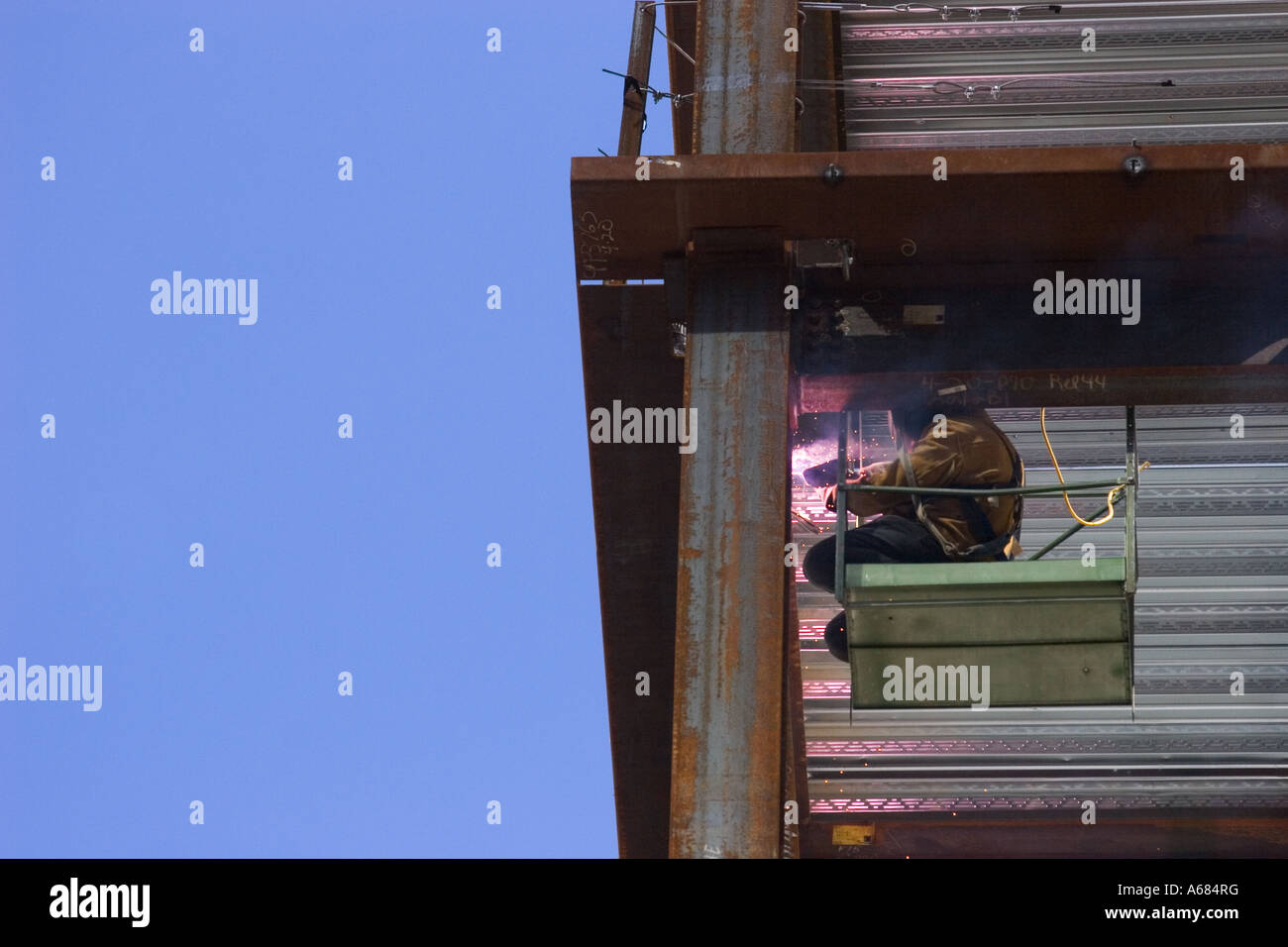 Construction welding on high rise hi-res stock photography and images ...