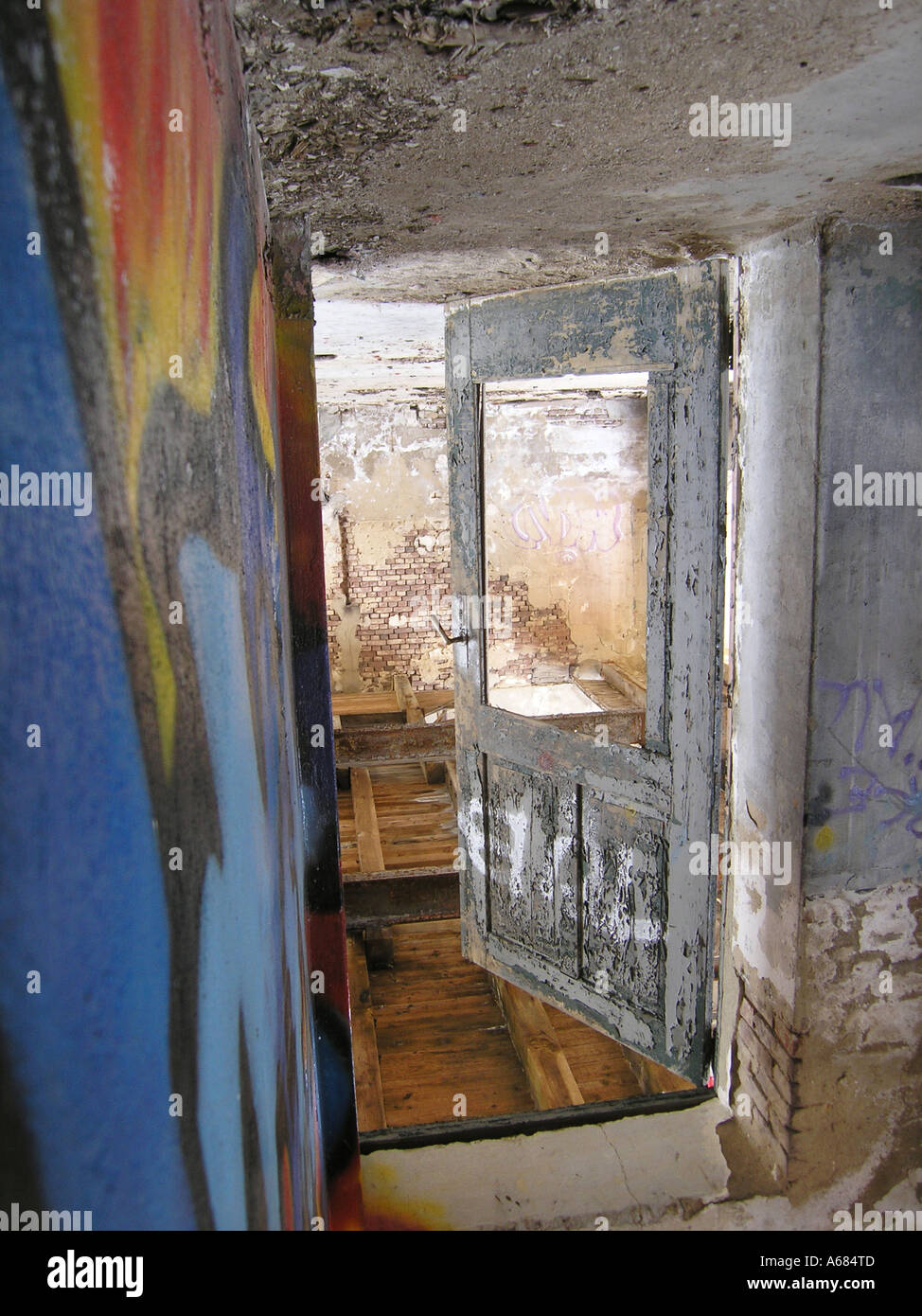 Desolate doorway into empty room of disused factory Stock Photo - Alamy