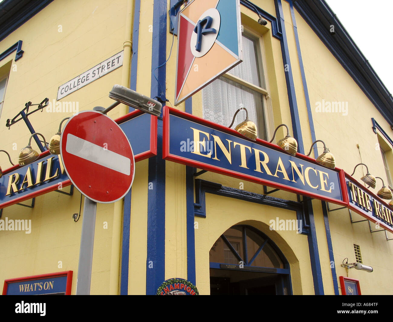 pub entrance next to no entry sign Stock Photo - Alamy