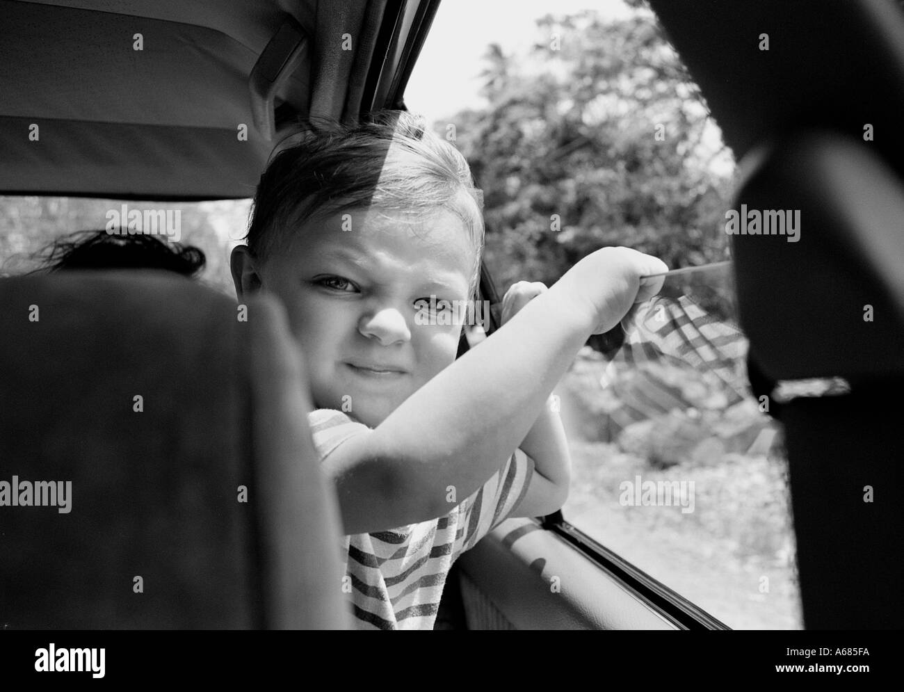 Boy camera car window Black and White Stock Photos & Images - Alamy