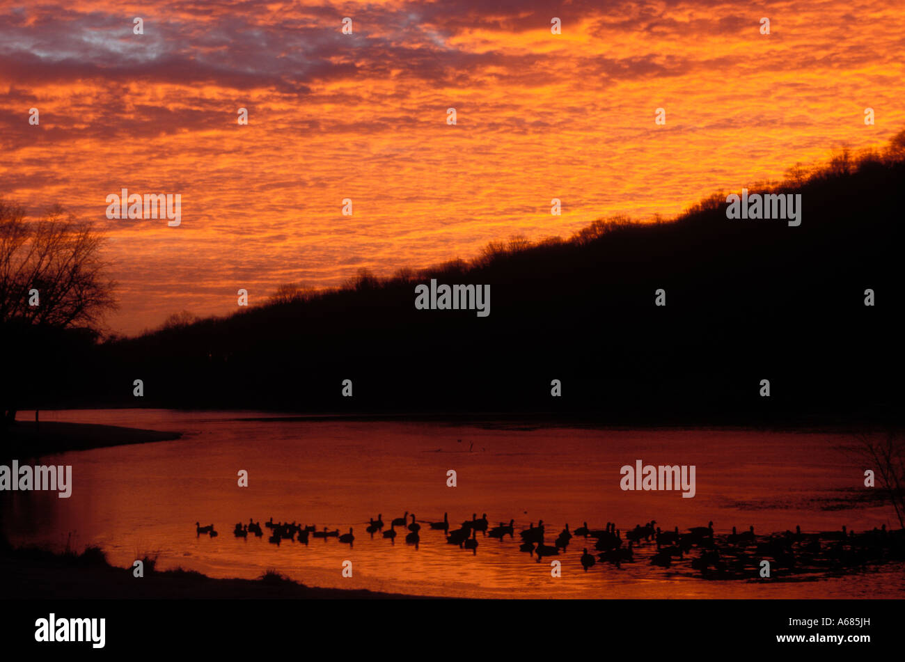 Fiery Sky, Frozen Lake Stock Photo - Alamy