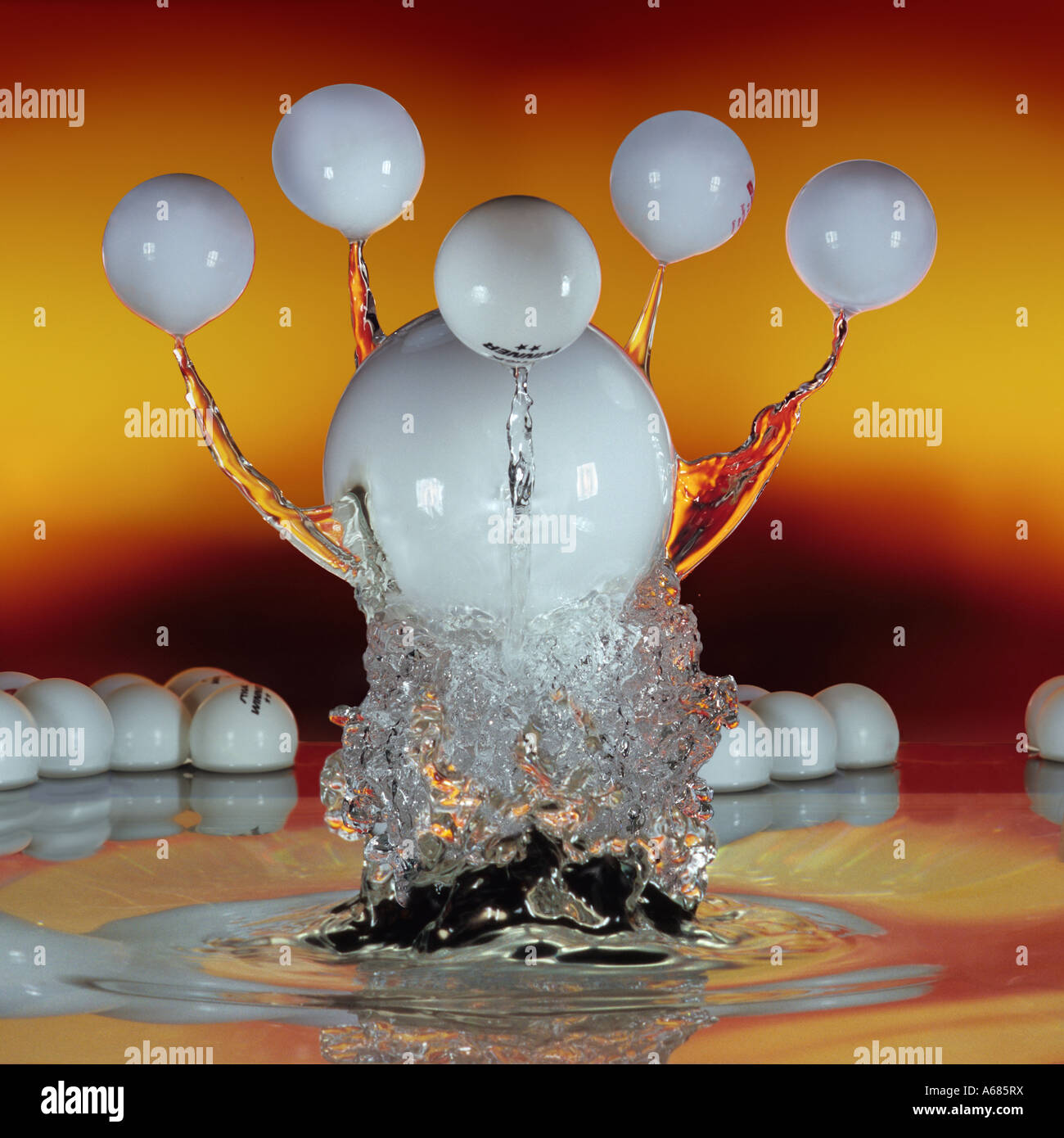 ping pong balls leaping out of water Stock Photo - Alamy