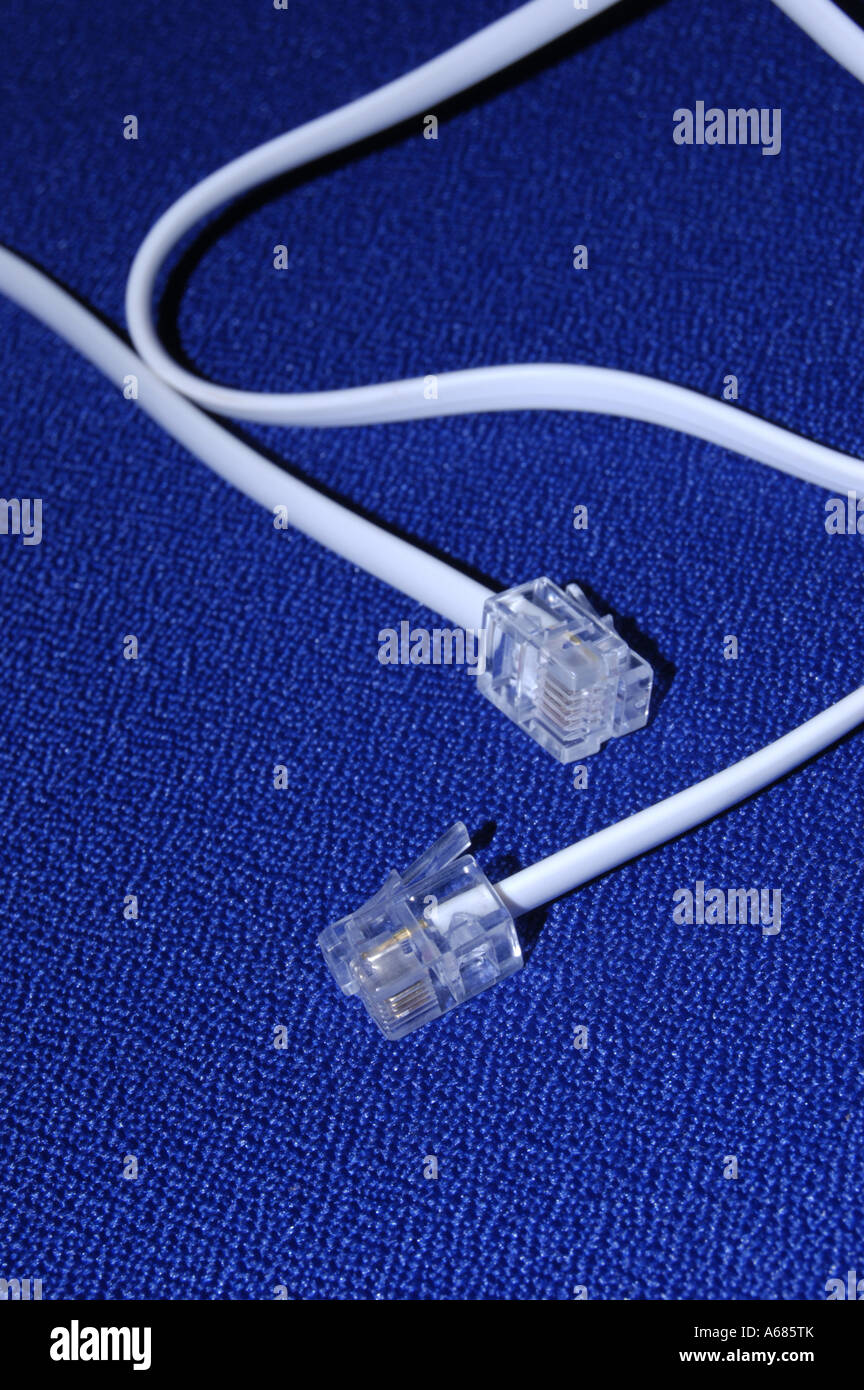 Telephone Cord on Blue Background Stock Photo - Alamy
