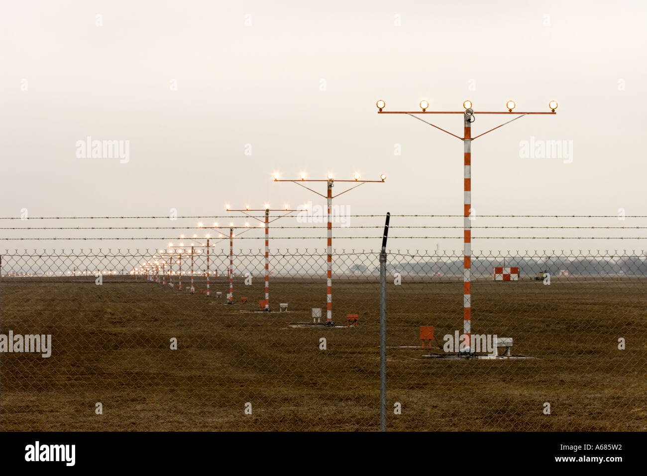 Approach Lights USAF Base with fence Stock Photo - Alamy