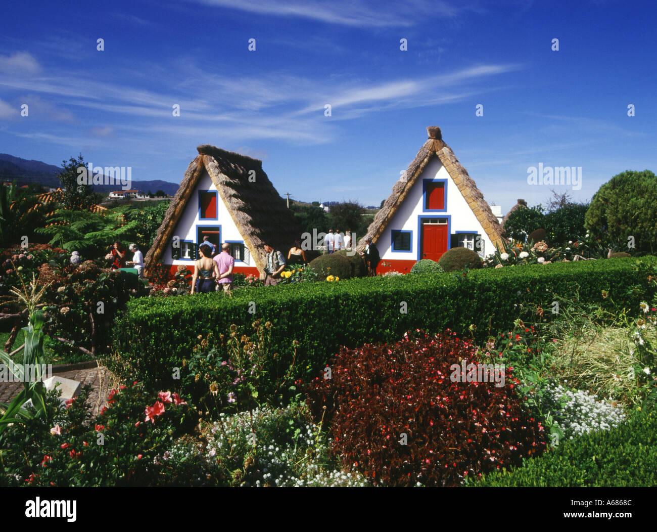 dh SANTANA MADEIRA Tourists Traditional Madeira styled thatched houses ...