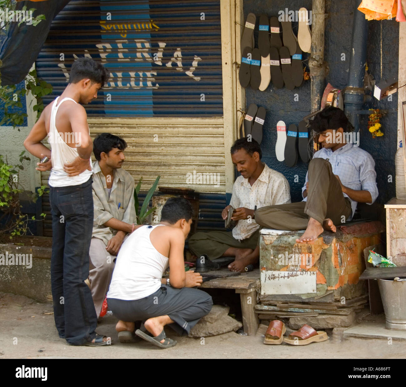 Shoe mender hi-res stock photography and images - Alamy