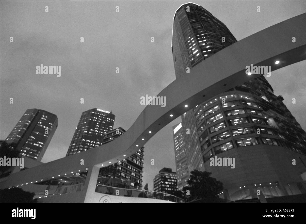 High rise modern glass office block buildings reflecting clouds hi-res ...