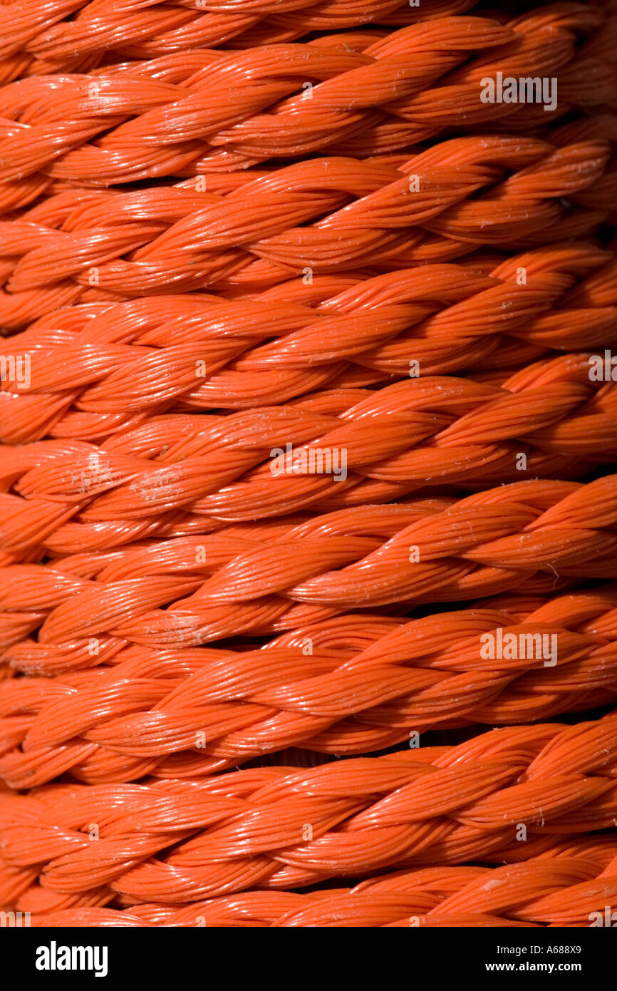 Closeup of a coil of braided orange nylon rope Stock Photo - Alamy