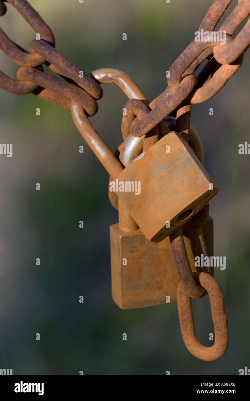 Two padlocks locked together hi-res stock photography and images - Alamy