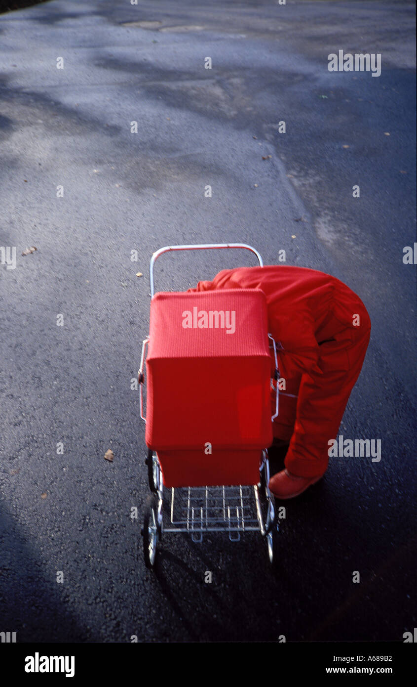 Gei 3428child leaning over puppet chart Stock Photo - Alamy