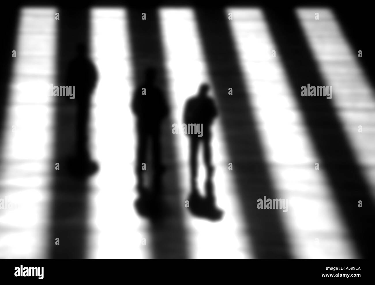 Back lit silhouettes of people out of focus Stock Photo - Alamy