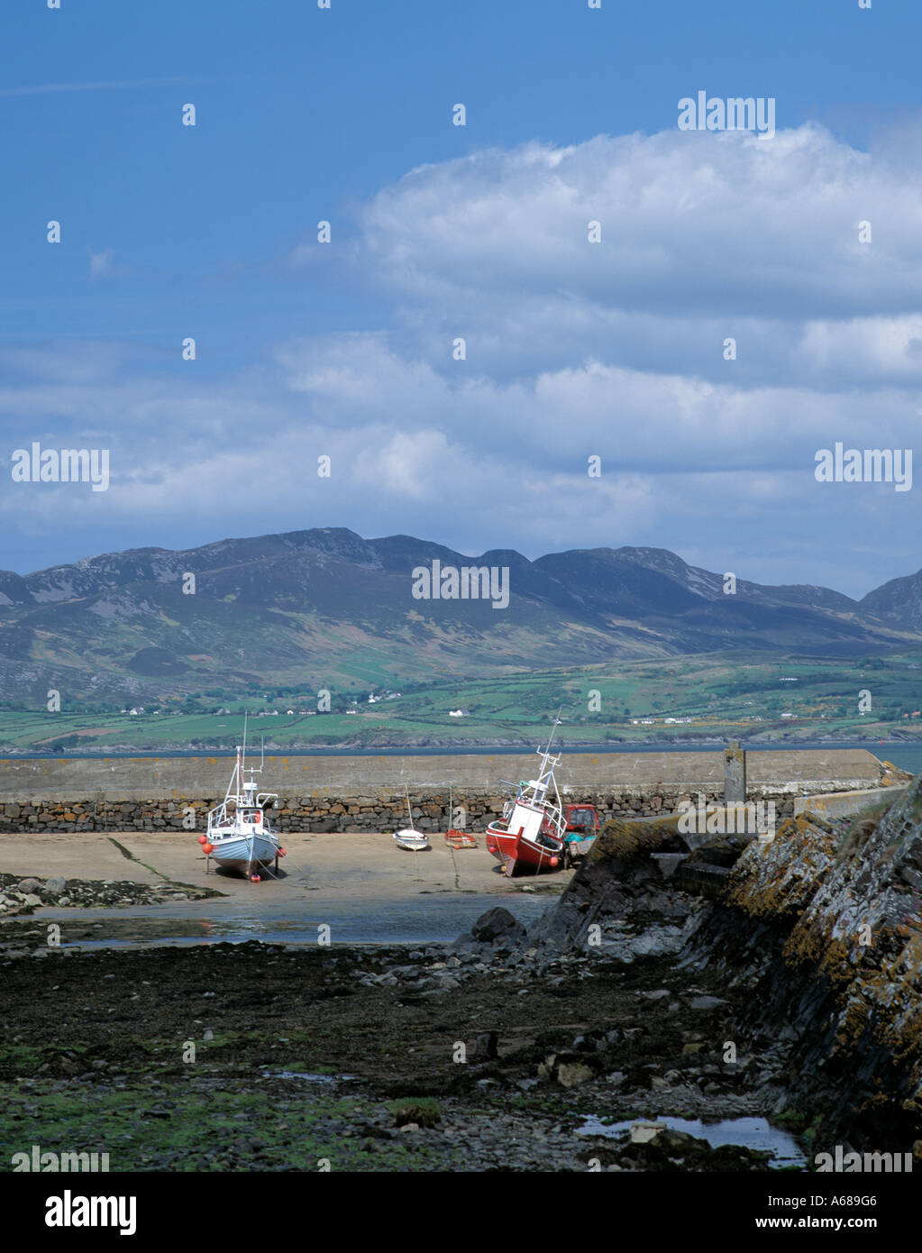 ireland county donegal harbor fishing boats sitting on the sand of an ...