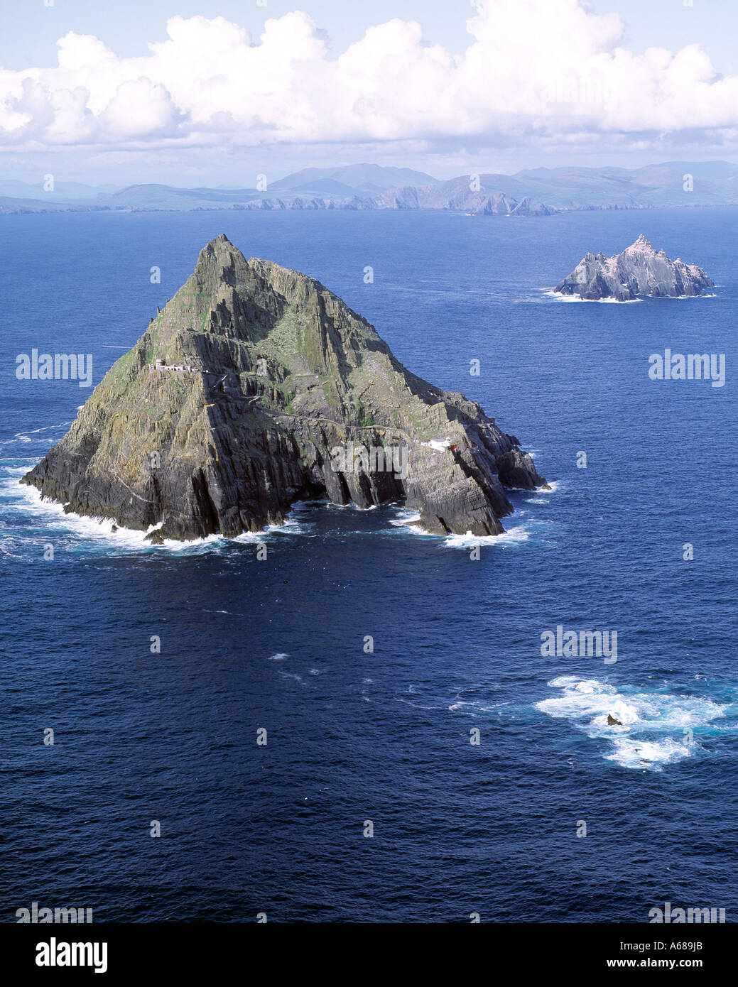 craggy island with lighthouse off kerrys atlantic coast with ...